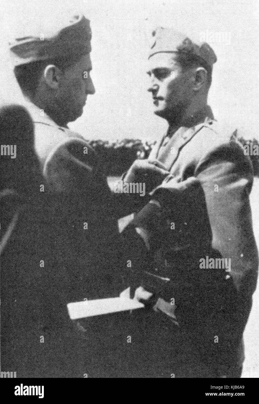 Erih Lisak decorates an officer Stock Photo - Alamy