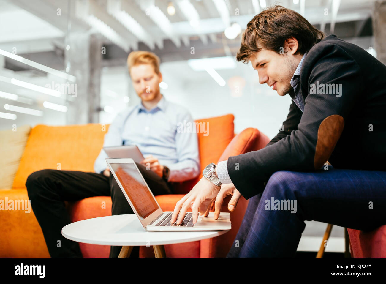 Business colleagues resting during break Stock Photo - Alamy