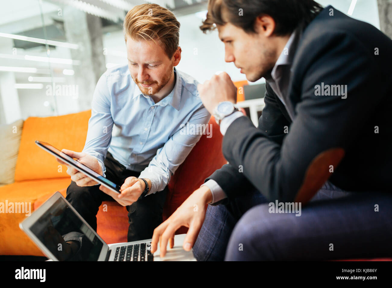 Business colleagues resting during break Stock Photo - Alamy