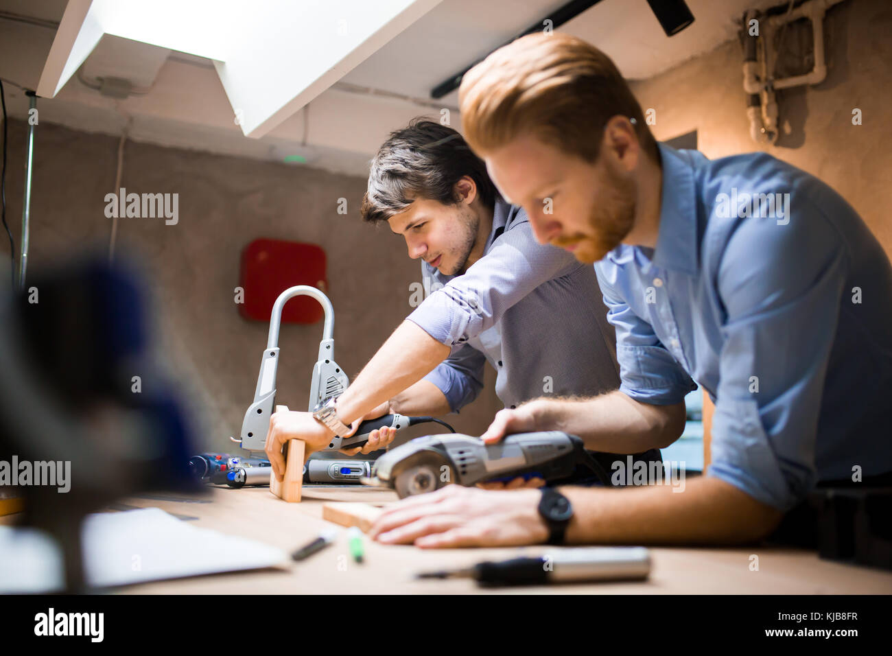 Two designers working together Stock Photo - Alamy