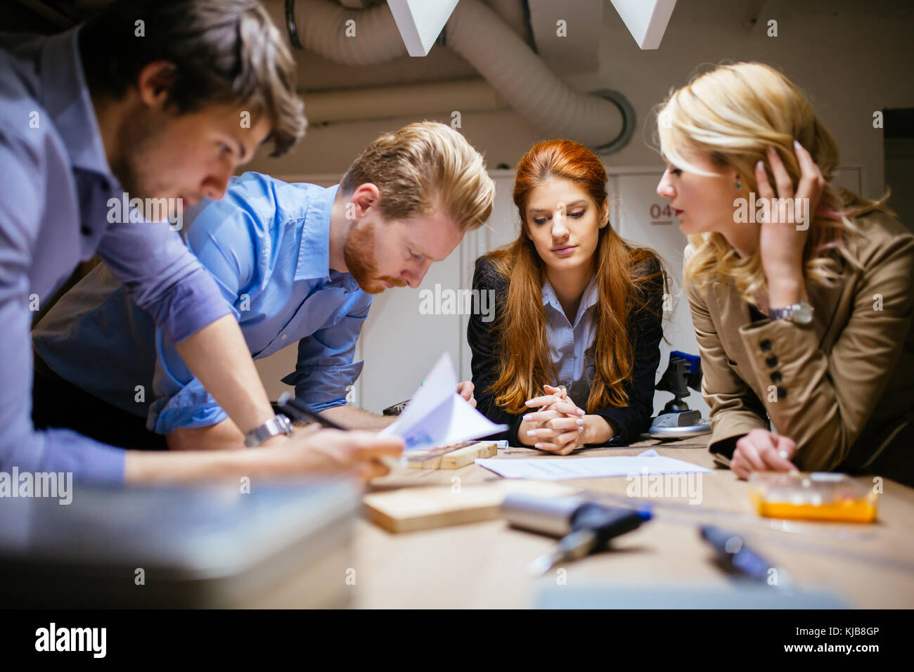 Group of creative designers brainstorming Stock Photo - Alamy