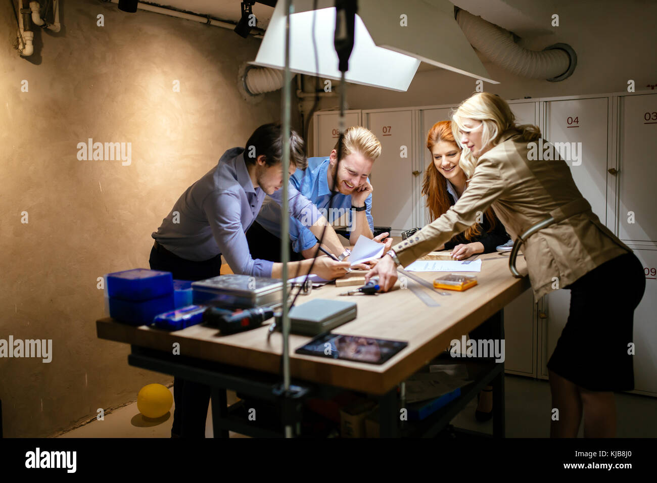 Group of creative designers brainstorming Stock Photo - Alamy