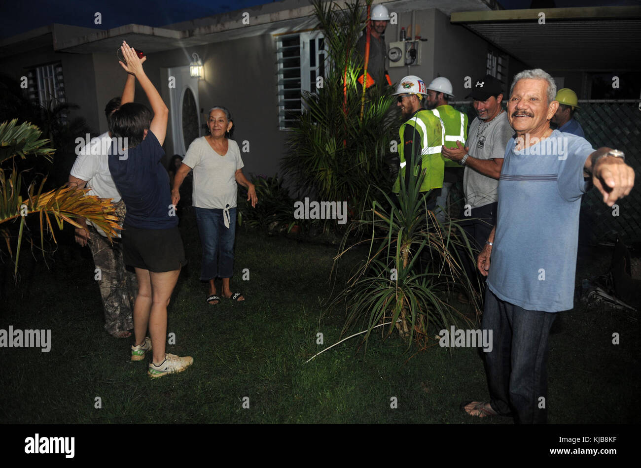 AGUADILLA, Puerto Rico – Neighbors celebrate outside the home of Mara ...