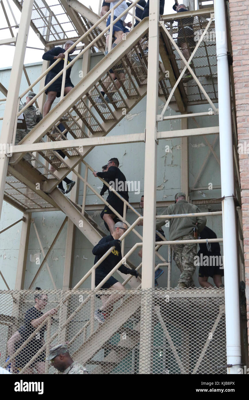 Troops from USFOR-A (NSE) run up stairs to complete another set of ...