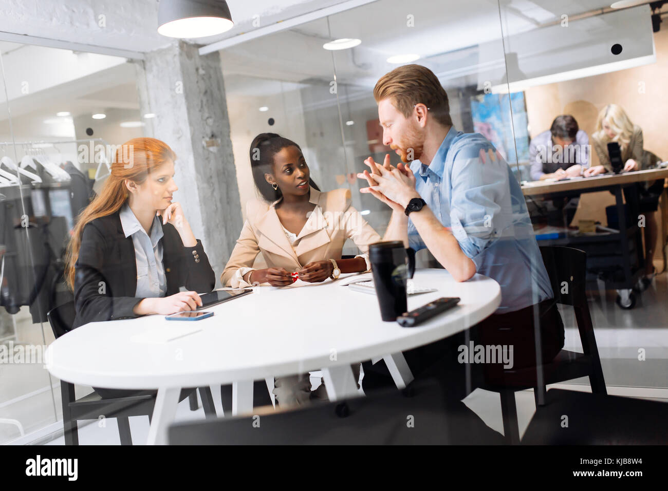 Business people meeting at round table Stock Photo - Alamy