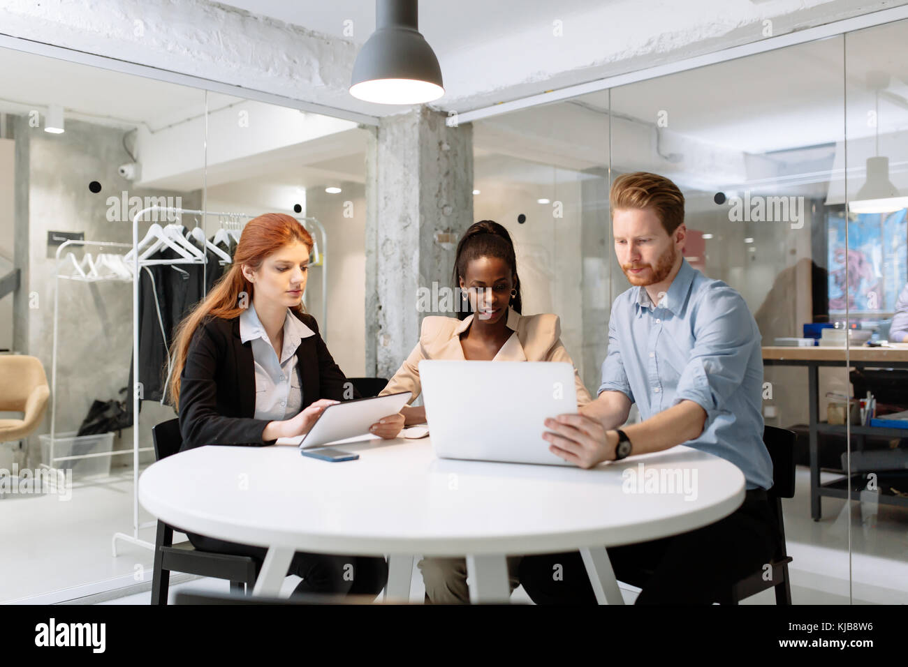 Business people meeting at round table Stock Photo - Alamy
