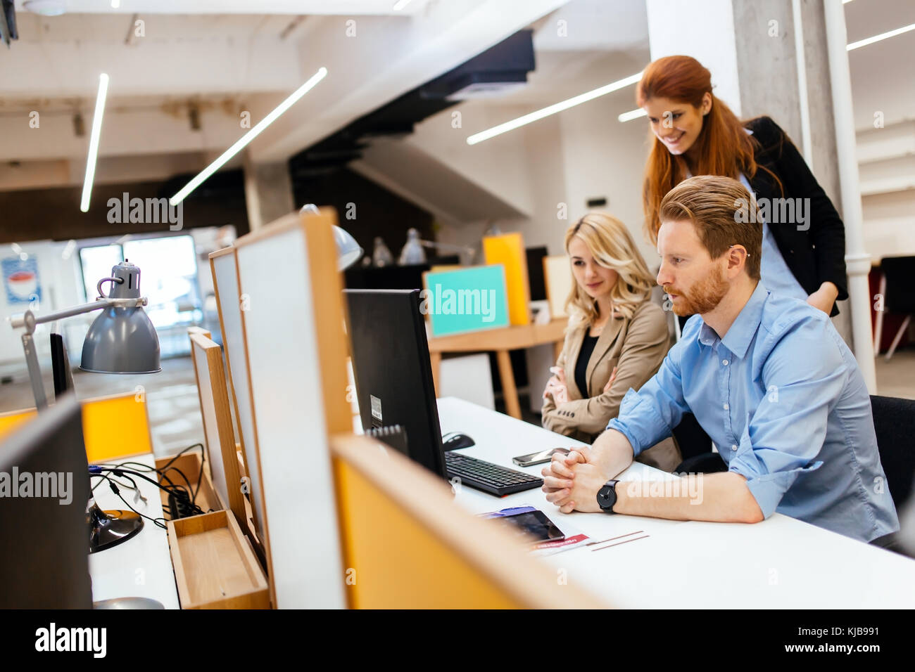 Business people collaborating in office Stock Photo - Alamy