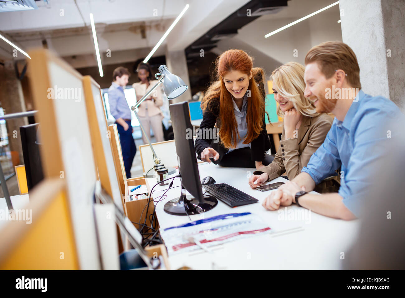 Team designers work sitting table hi-res stock photography and images ...
