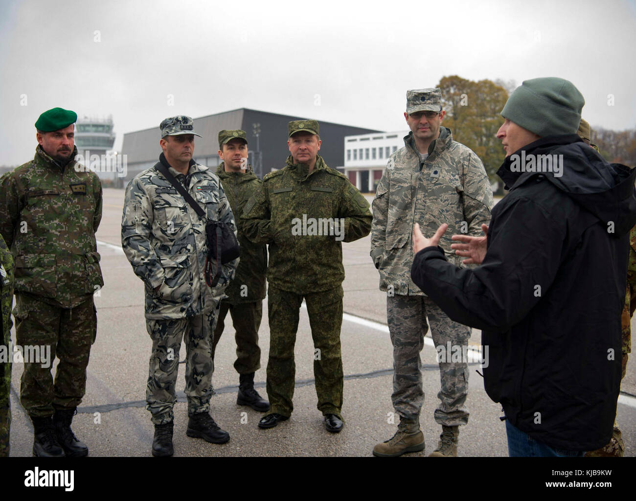 An 86th Security Forces Squadron Raven, left, speaks about his job to ...