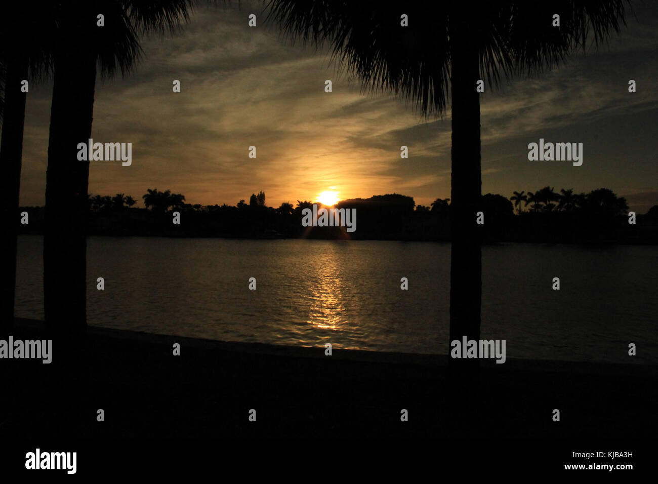 A stunning view of the Miami sunset over the horizon, with vibrant ...