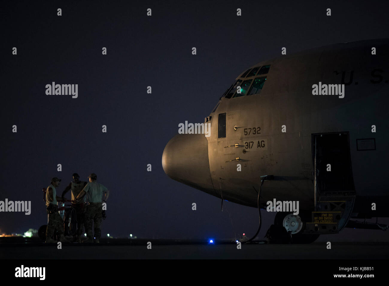 U.S. Airmen from the 75th Expeditionary Airlift Squadron (EAS) conduct ...