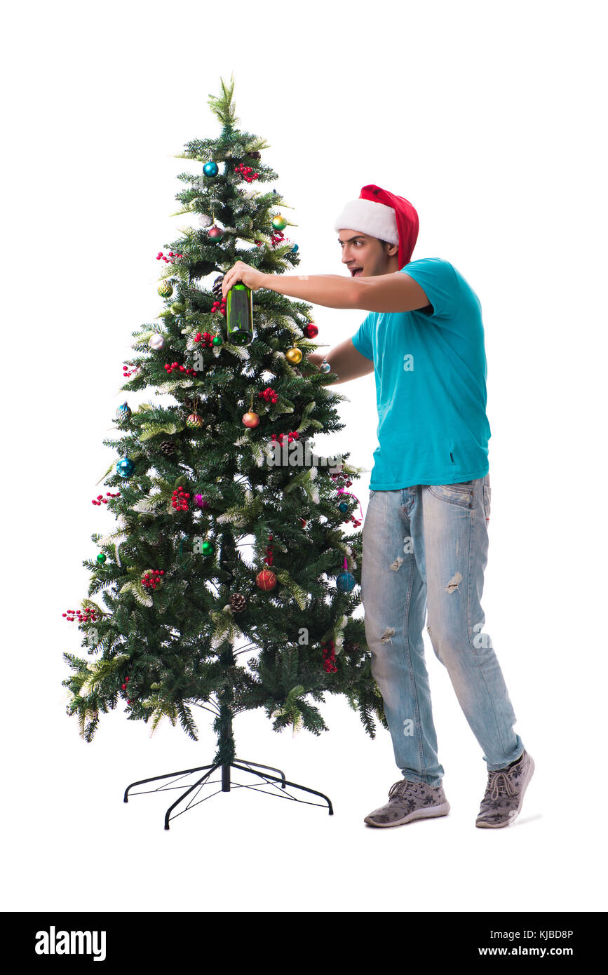 Young man decorating christmas tree isolated on white Stock Photo - Alamy