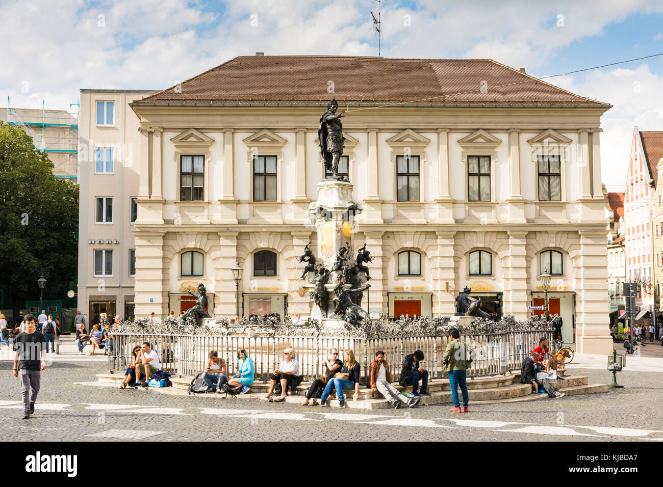 AUGSBURG, GERMANY - AUGUST 19: Tourists at the Augustus fountain in ...