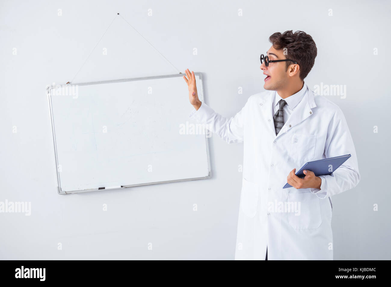 Funny doctor scientist making presentation in hospital Stock Photo - Alamy
