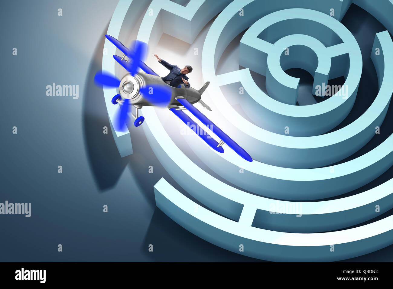 Businessman escaping from maze on airplane Stock Photo - Alamy