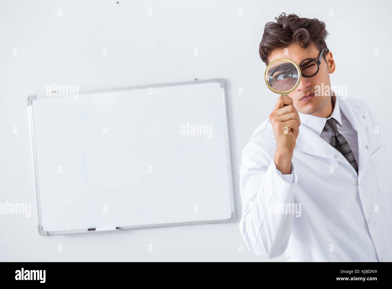 Funny doctor scientist making presentation in hospital Stock Photo - Alamy