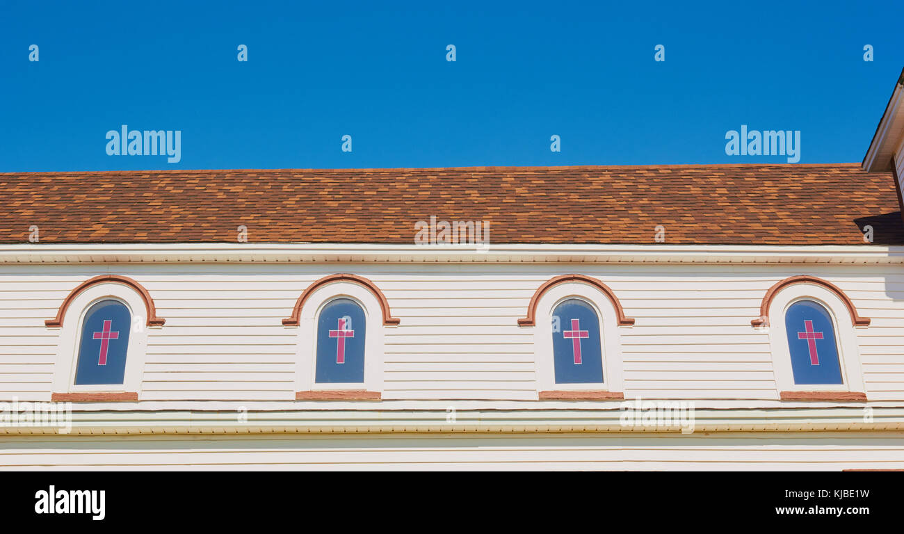 Line of crosses in windows of wooden church, Canada Stock Photo - Alamy