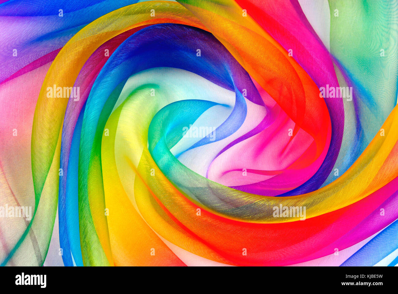twisted twirl of organza fabric multicolour texture Stock Photo - Alamy