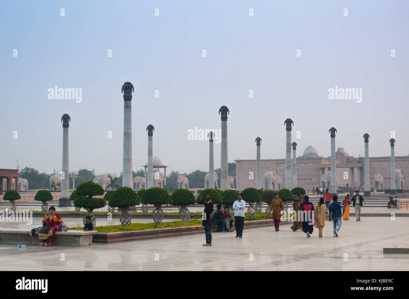 Families walk past the pillars at Ambedkar Park Stock Photo - Alamy