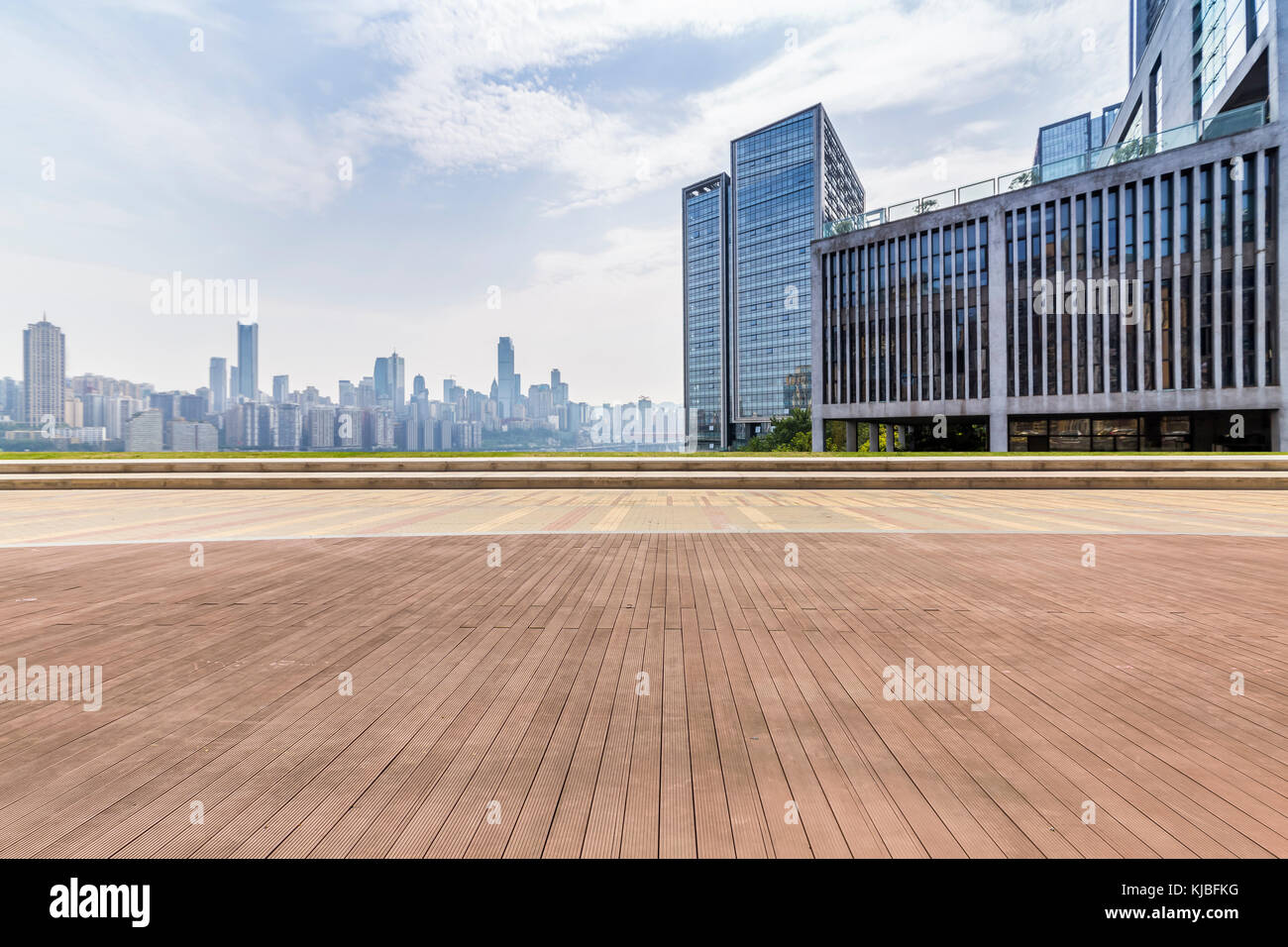 Panoramic skyline and buildings with empty concrete square floor ...
