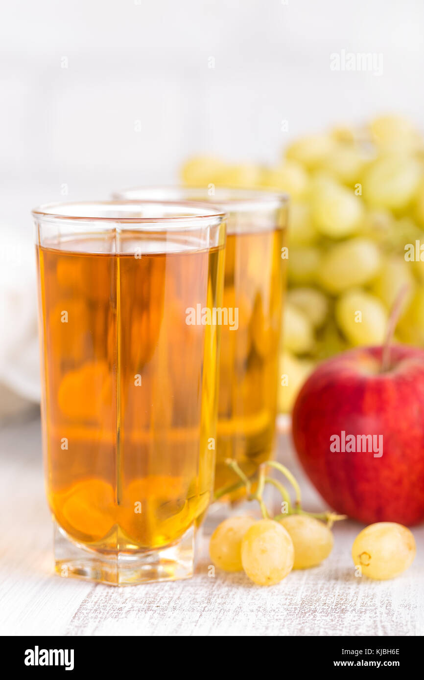 Grape and apple juice Stock Photo - Alamy