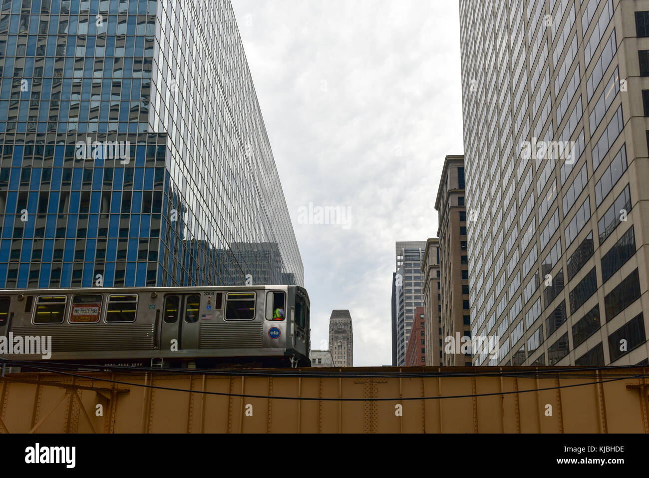 Chicago train on the overhead track of Loop with skyscrapers Stock ...