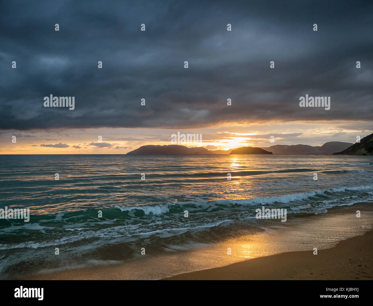beautiful beach with sunset in the beautiful island of Zante in Greece ...