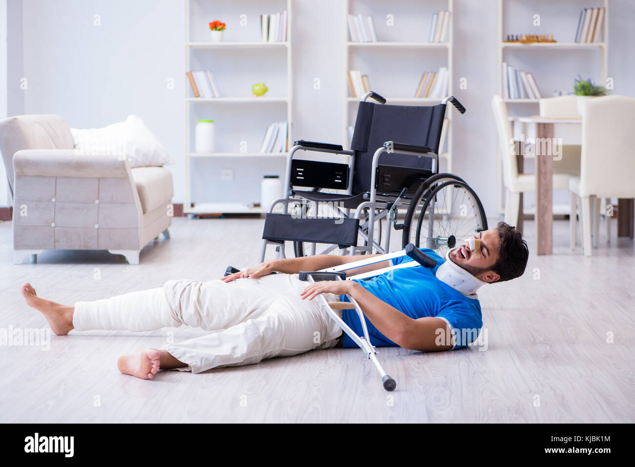 Injured young man recovering at home Stock Photo - Alamy