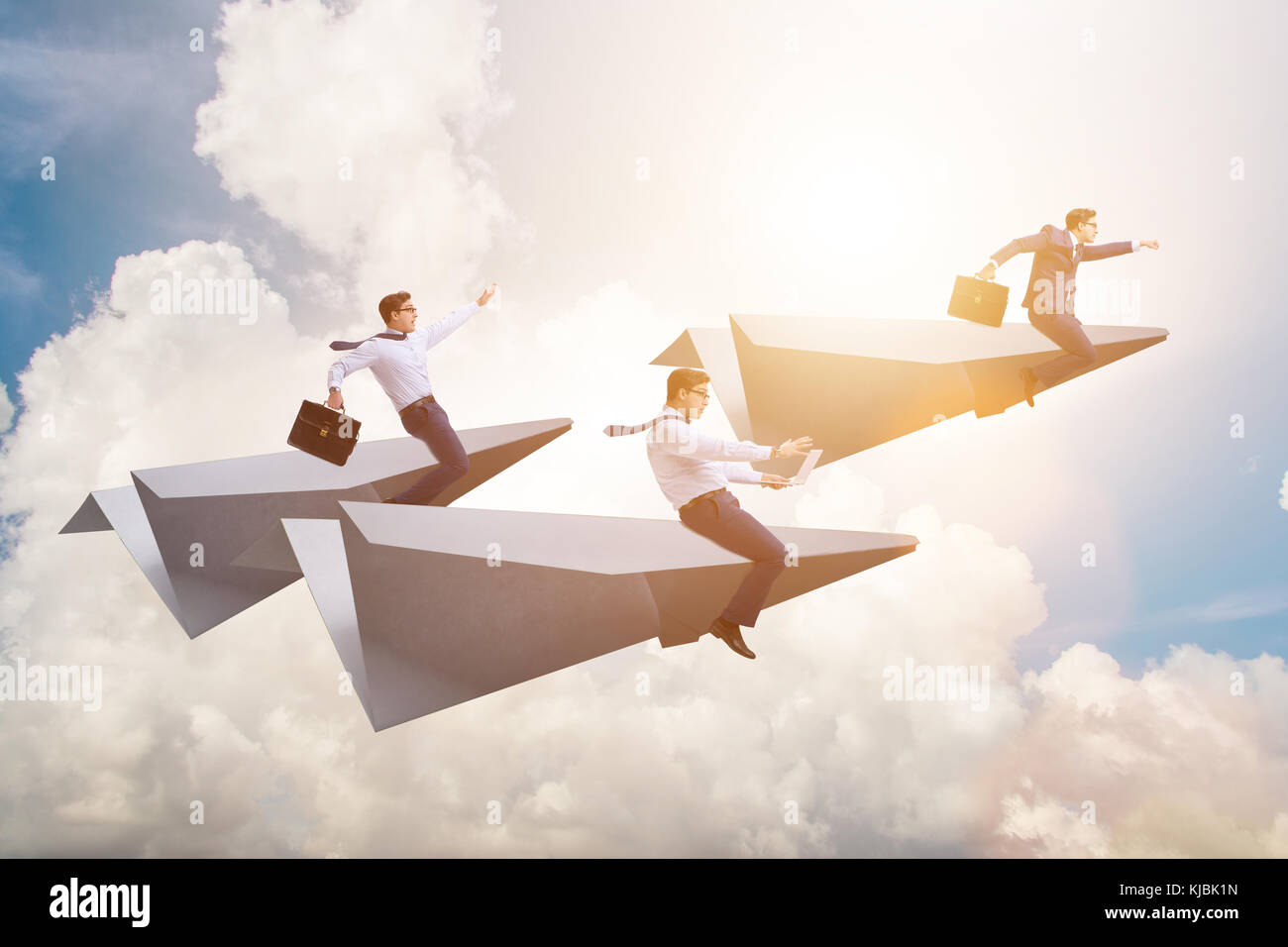 Businessman flying on paper plane in business concept Stock Photo - Alamy