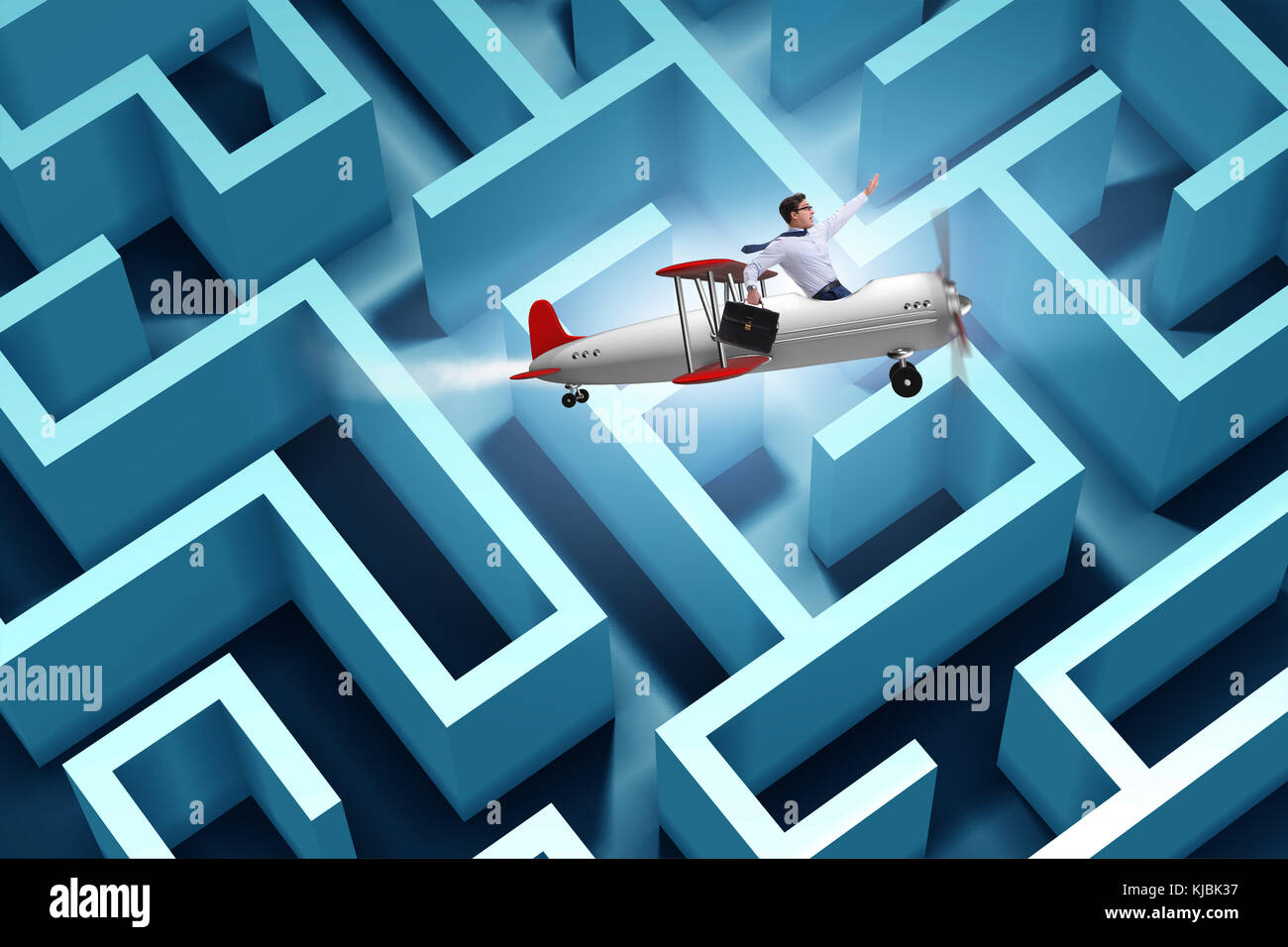 Businessman escaping from maze on airplane Stock Photo - Alamy