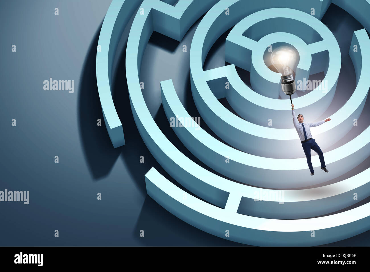 Businessman escaping from maze on balloon Stock Photo - Alamy
