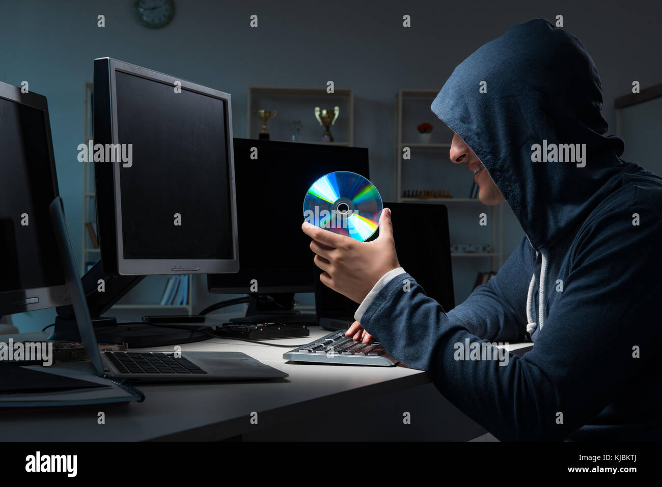 Hacker hacking computer at night Stock Photo - Alamy