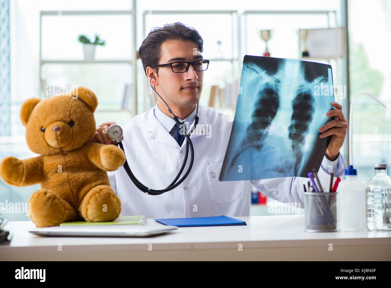 Baby radiologist with x-ray image Stock Photo - Alamy