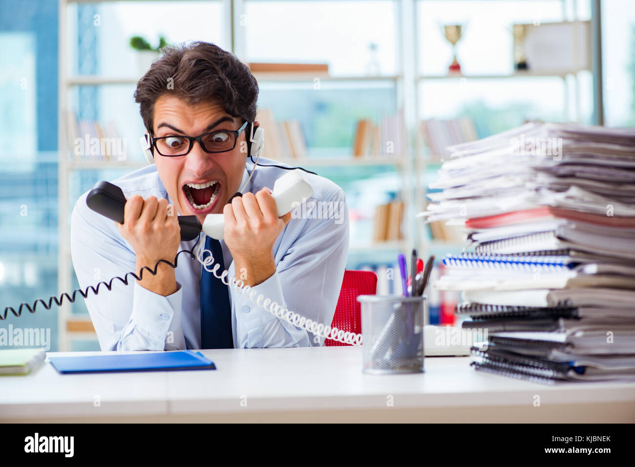 Call centre worker angry hi-res stock photography and images - Alamy