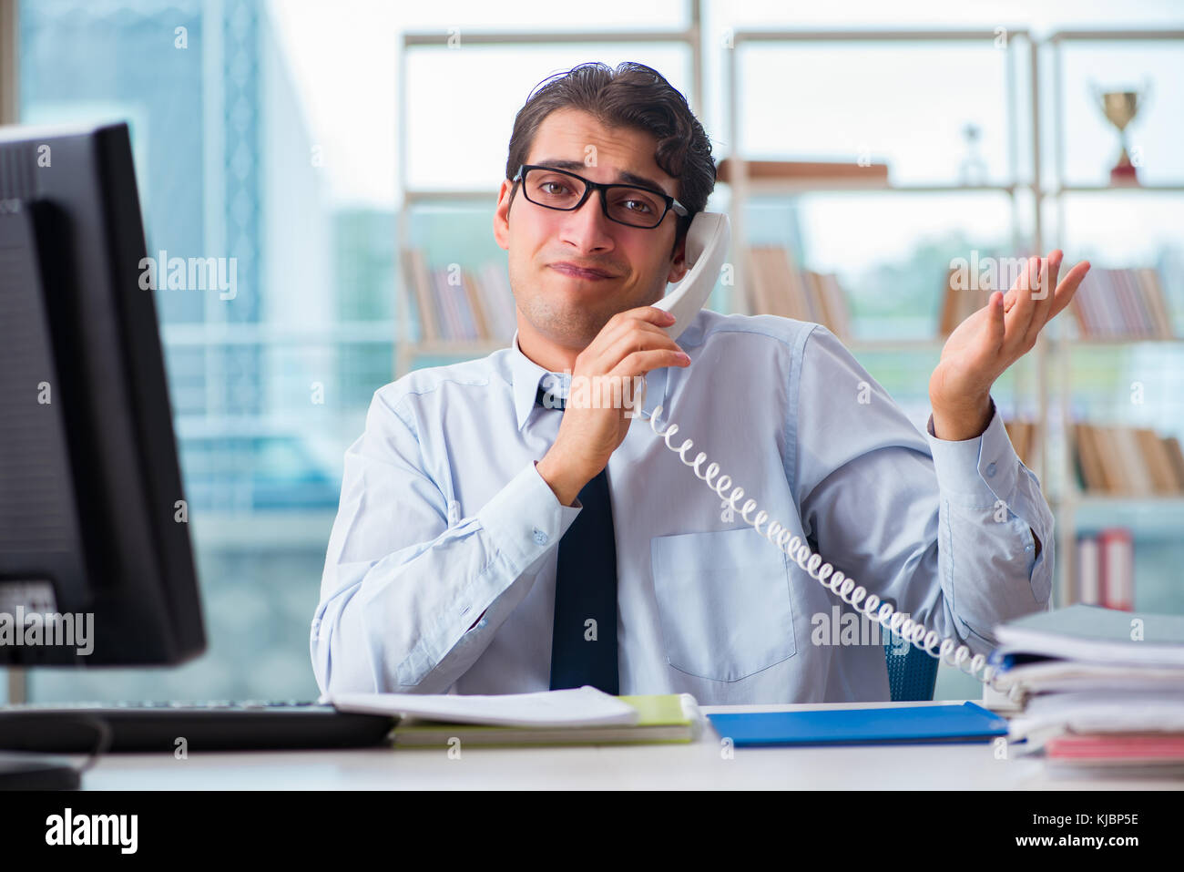 Man call centre unhappy hi-res stock photography and images - Alamy