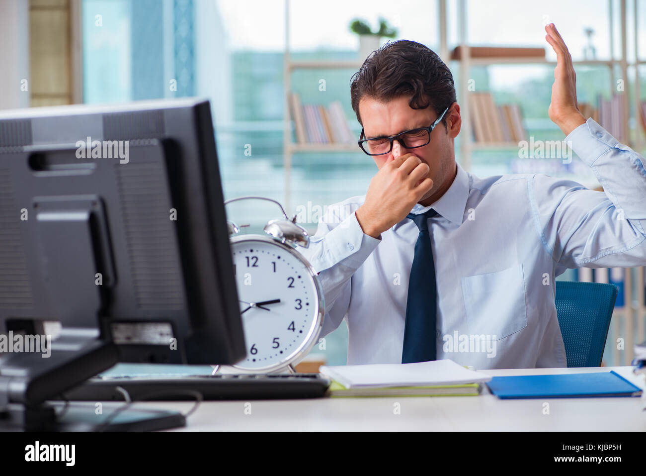 Businessman suffering from excessive armpit sweating Stock Photo - Alamy