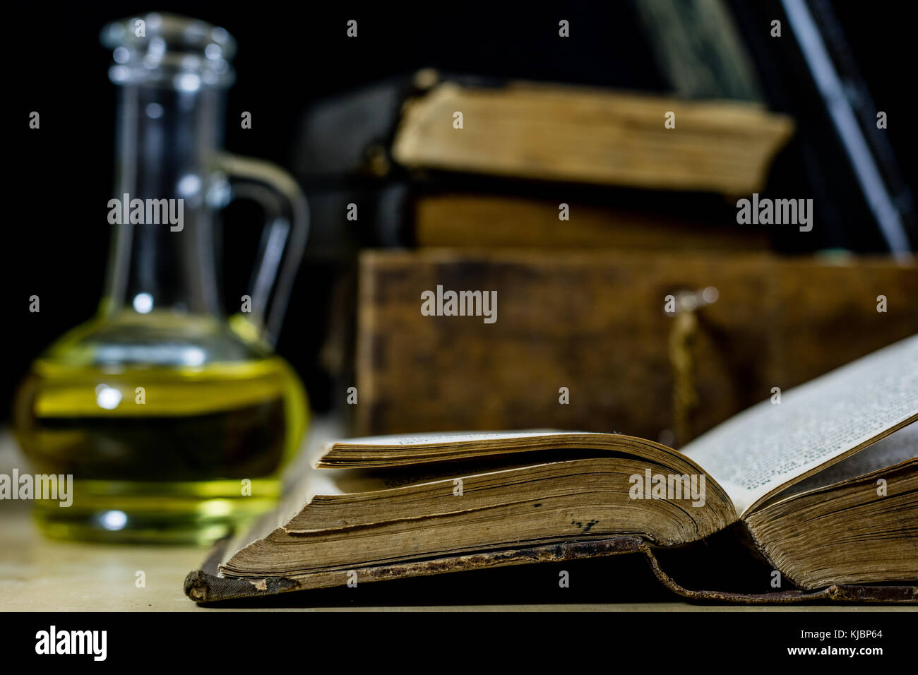 Old books and spices. Dried peppers and recipes. Old kitchen table ...