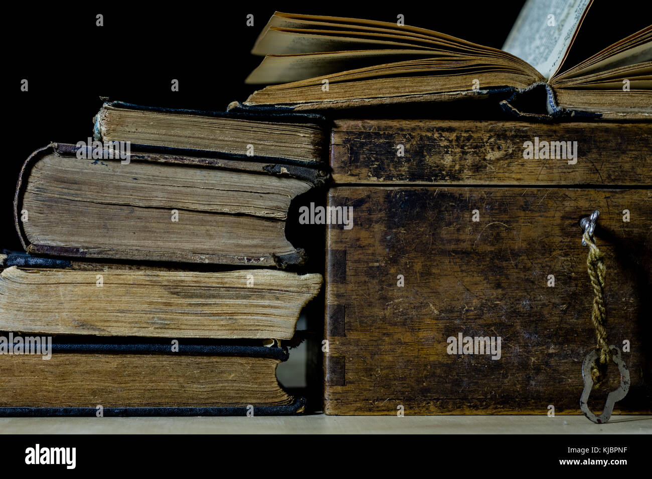 Old rolls and plans in folded paper rolls. Old book and case. Documents ...
