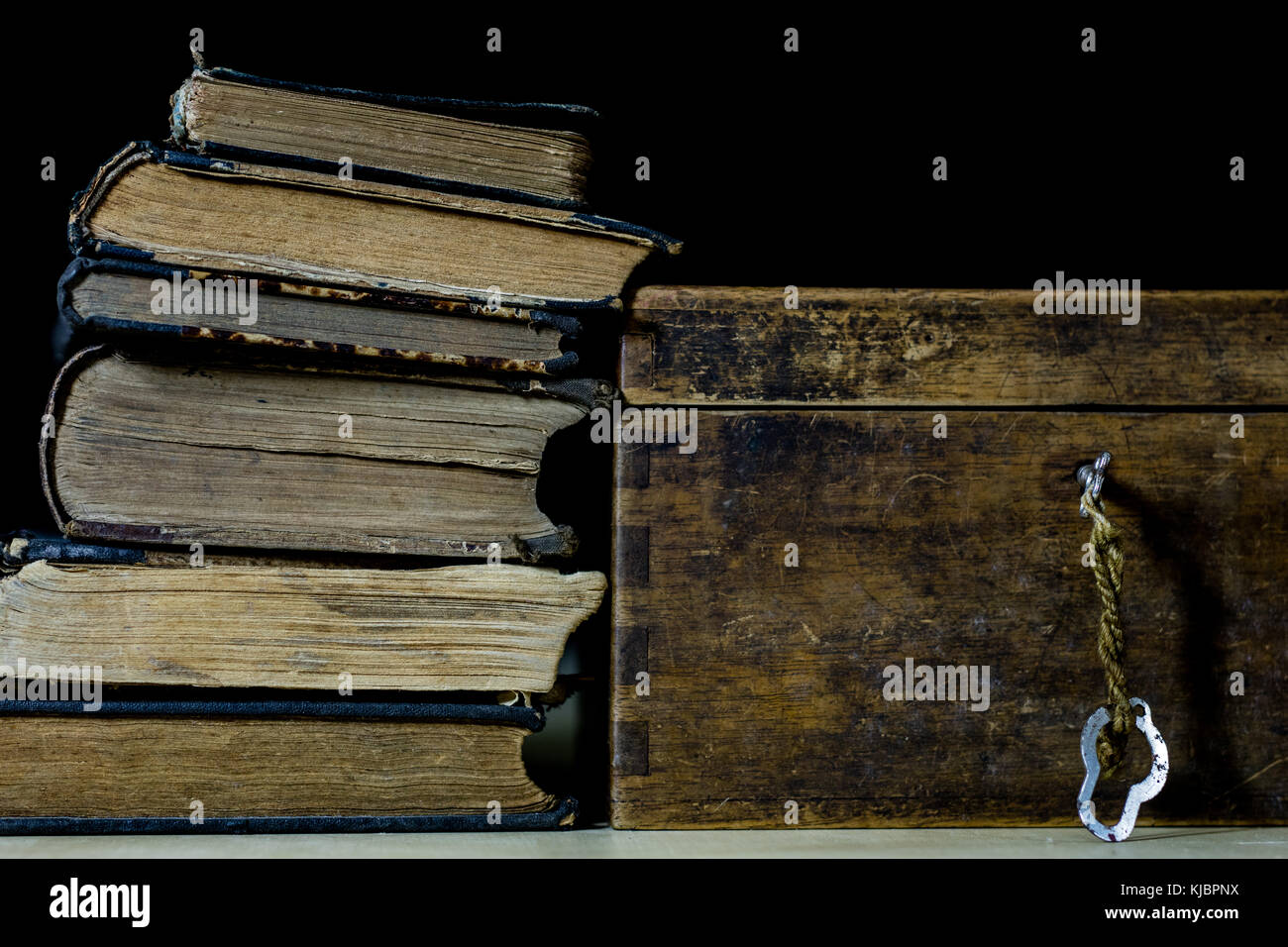 Old rolls and plans in folded paper rolls. Old book and case. Documents ...