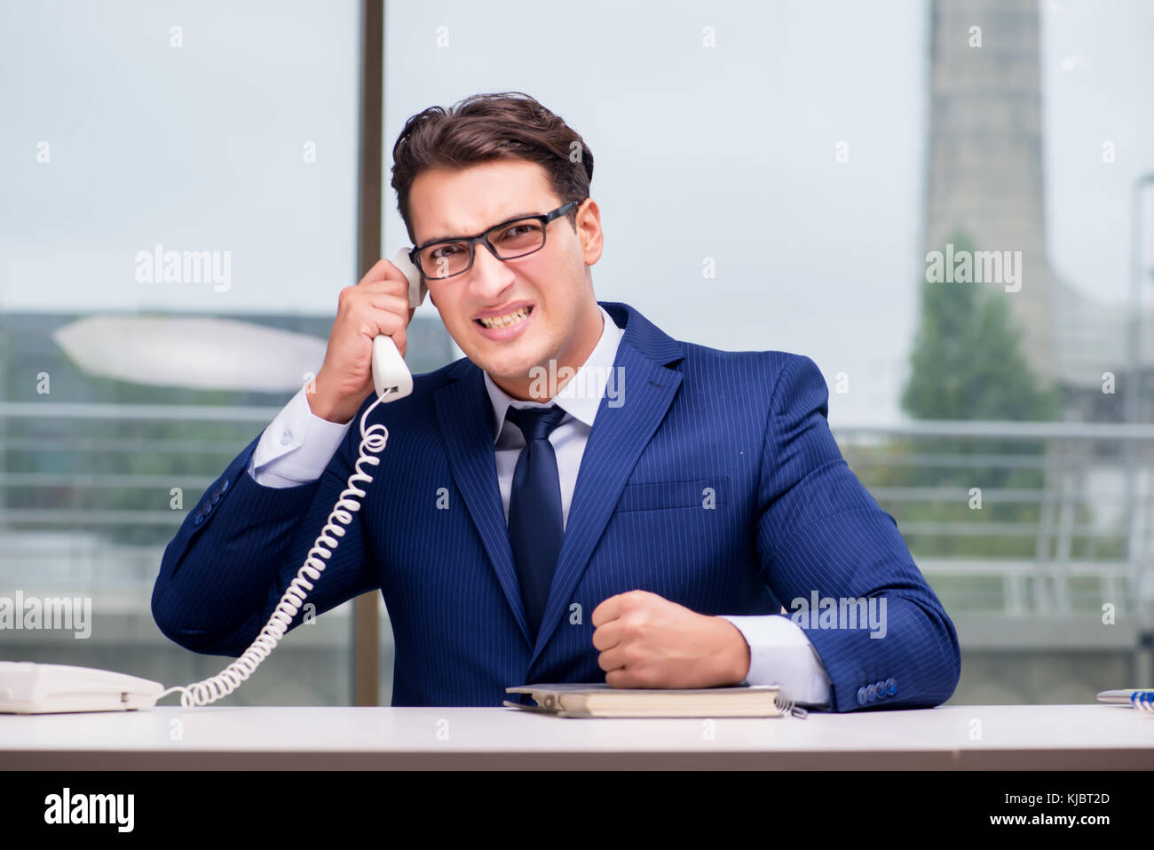 Angry call center employee yelling at customer Stock Photo - Alamy