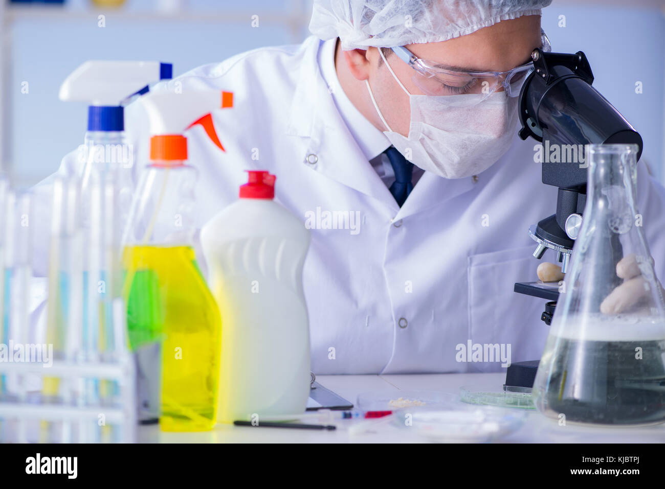 Man in the lab testing new cleaning solution detergent Stock Photo - Alamy