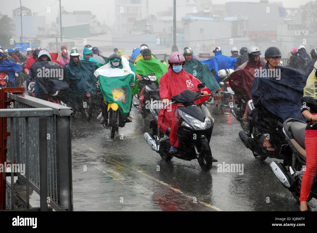 HO CHI MINH CITY, Asian people ride motorbike, difficult move in heavy ...