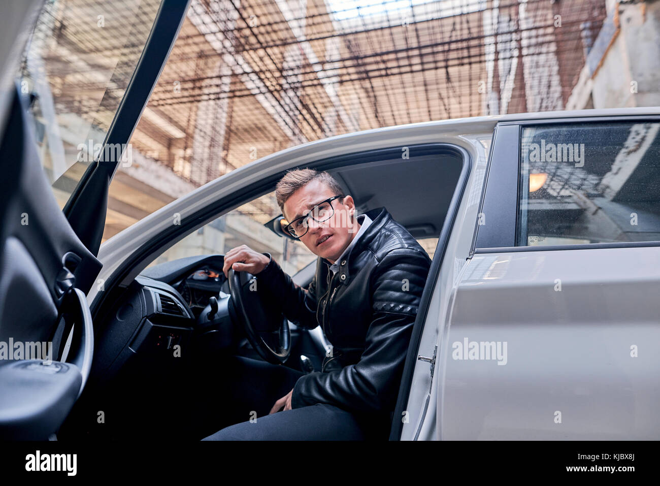 Man gets out of car hi-res stock photography and images - Alamy