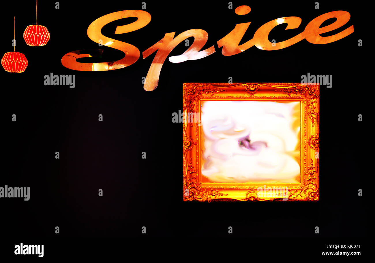 Spice sign with mirror and hanging decorations Stock Photo - Alamy