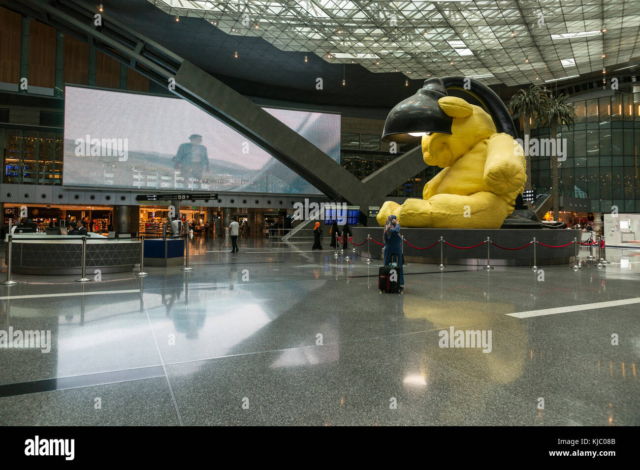 Teddy bear doha international airport hi-res stock photography and ...