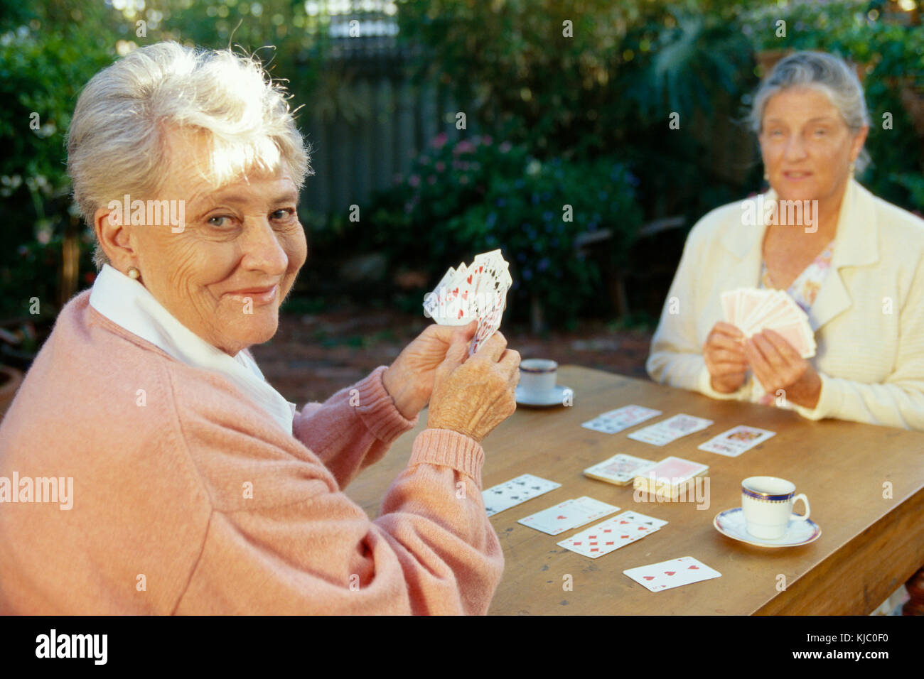 Women Playing Cards Stock Photo - Alamy