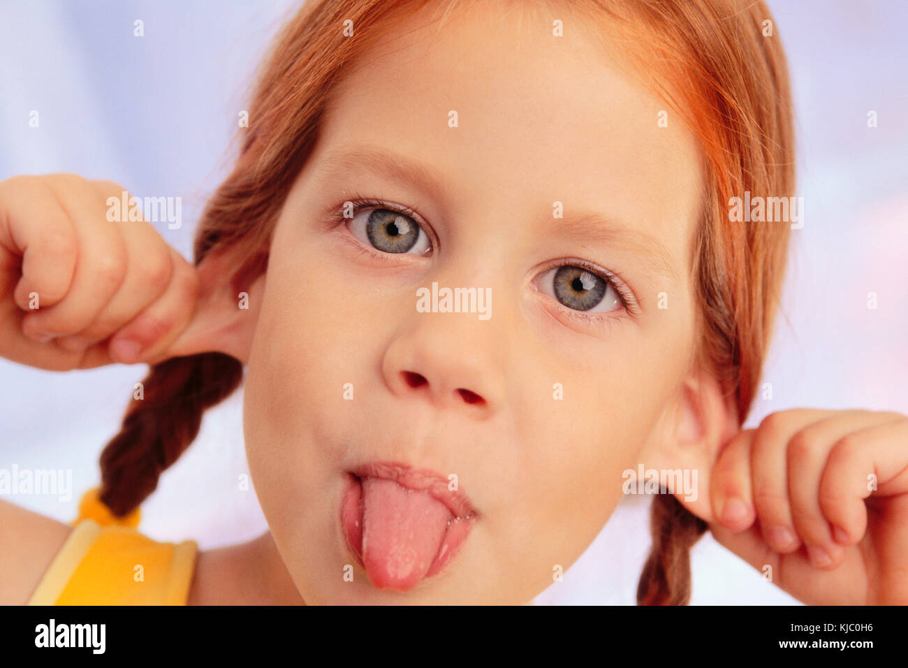 Portrait of Girl Making Faces Stock Photo - Alamy
