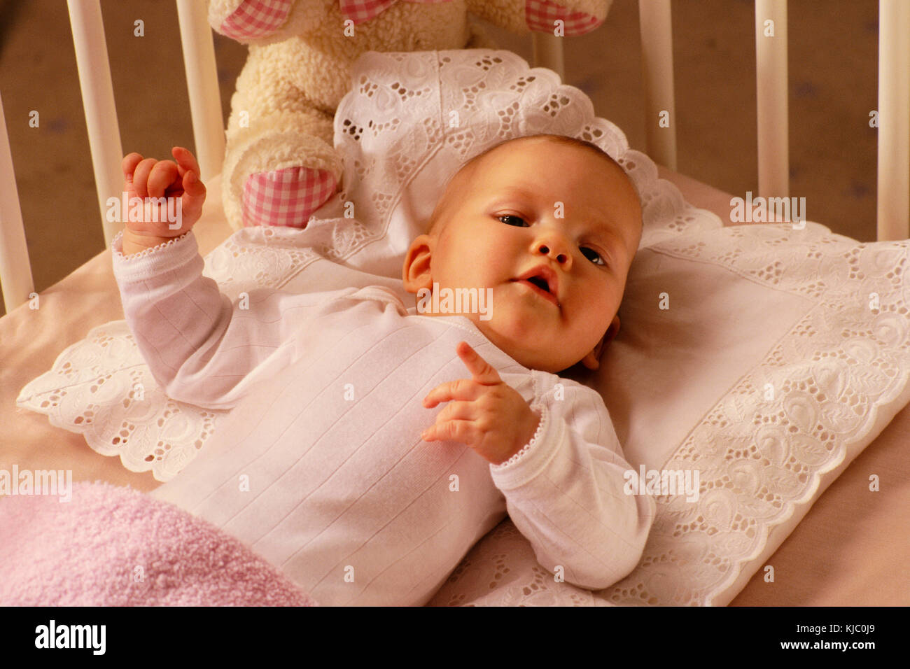 Portrait of Baby in Crib Stock Photo - Alamy
