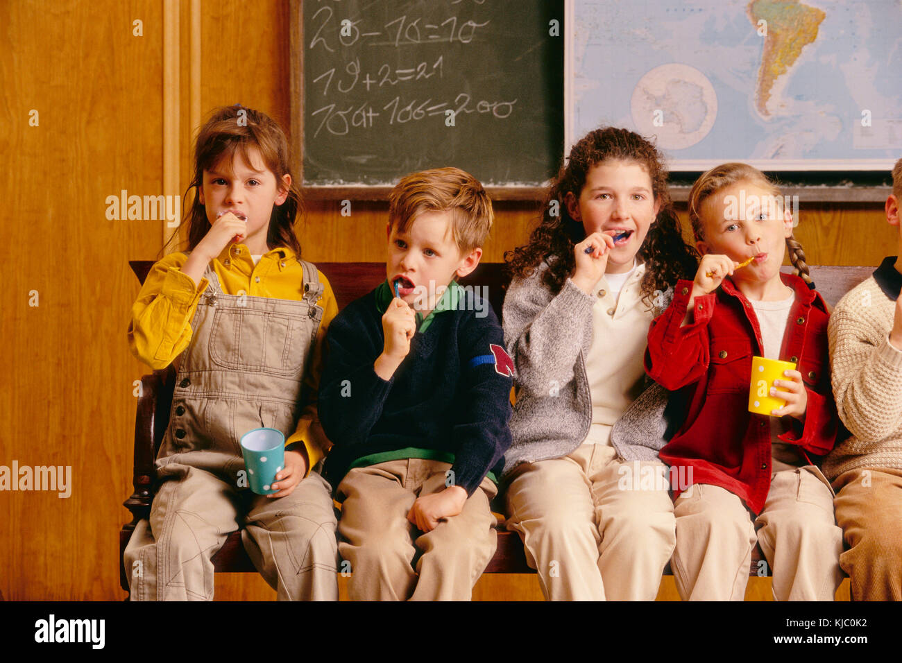 Children Brushing Teeth in Classroom Stock Photo - Alamy