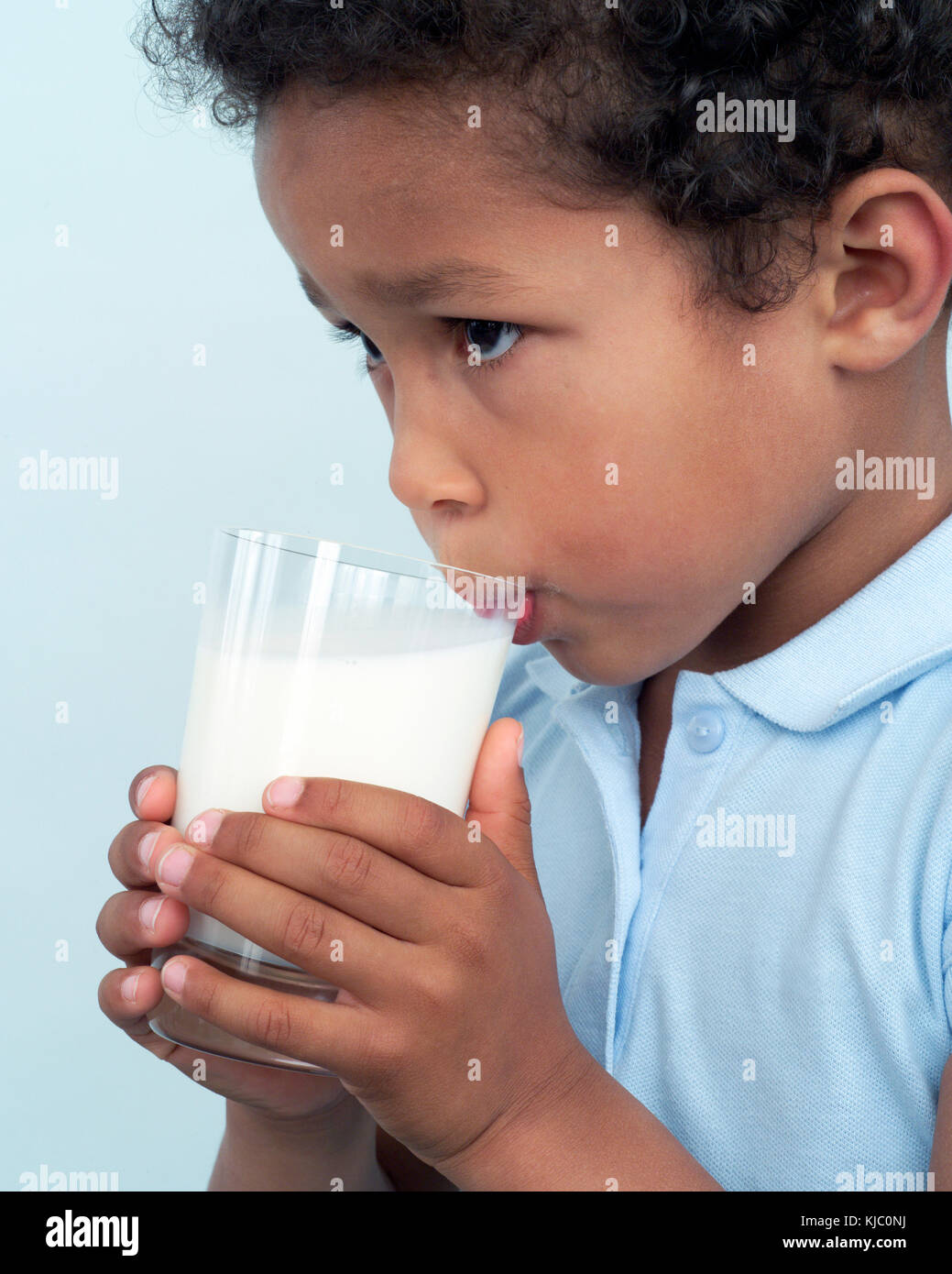 Boy Drinking Milk Stock Photo - Alamy